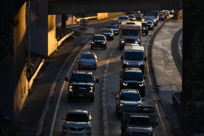 Trump plans to weaken vehicle mileage rules that limit air pollution