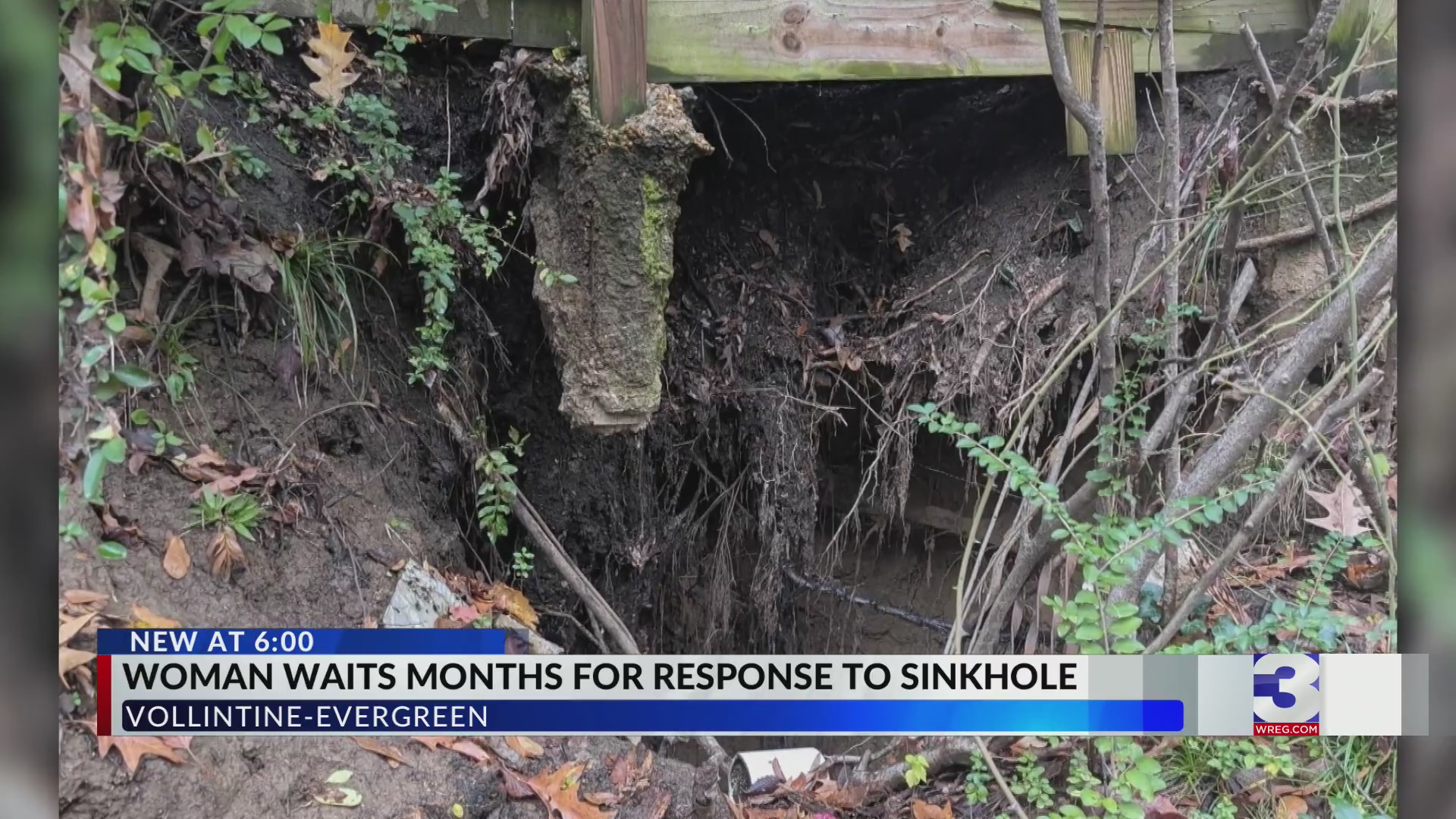 Woman says city responsible for large sinkhole in yard