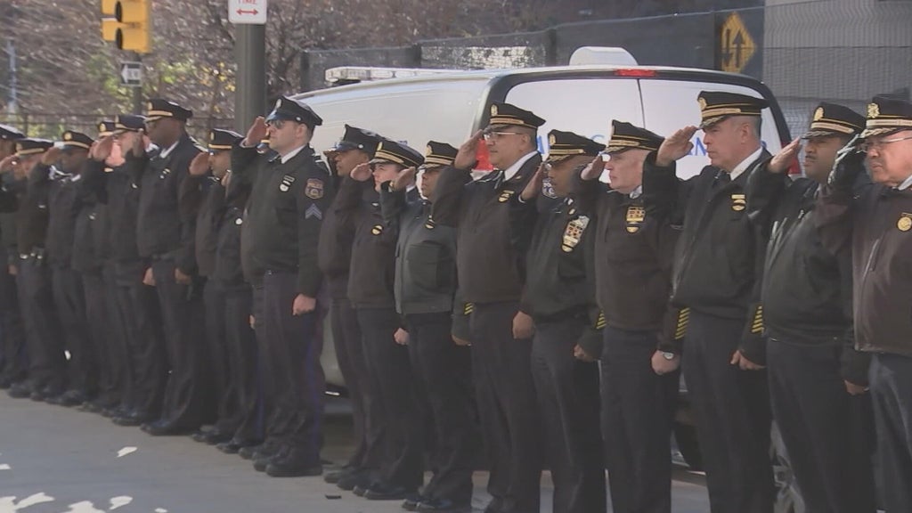 Philadelphia police escort body of Officer Andy Chan to headquarters ...