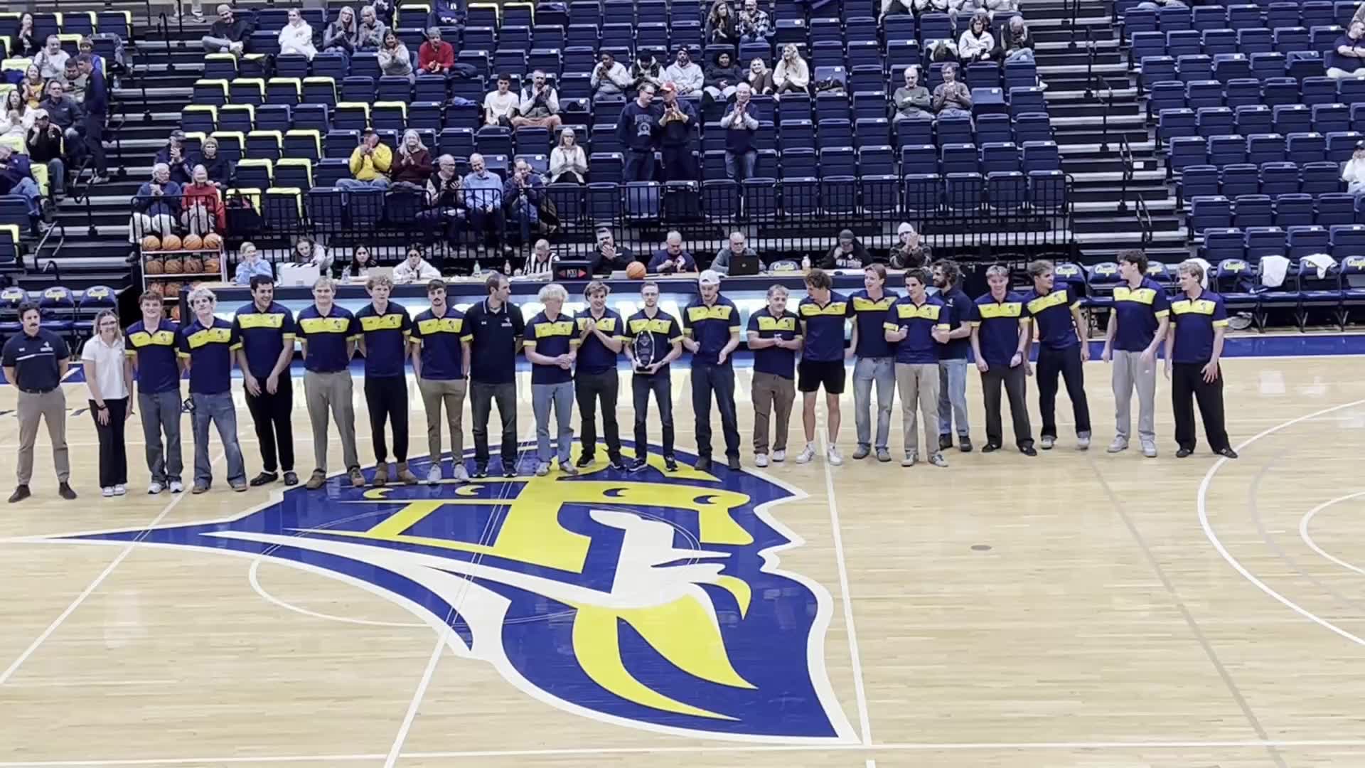 WHBF Augustana Men Water Polo Team honored at halftime