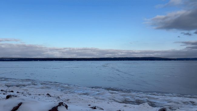 Sheet of ice forms over Lake Superior as temperatures drop below freezing