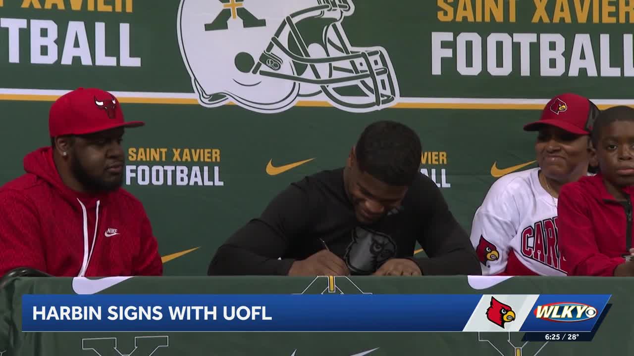 St. X football star Marlon Harbin signs with UofL