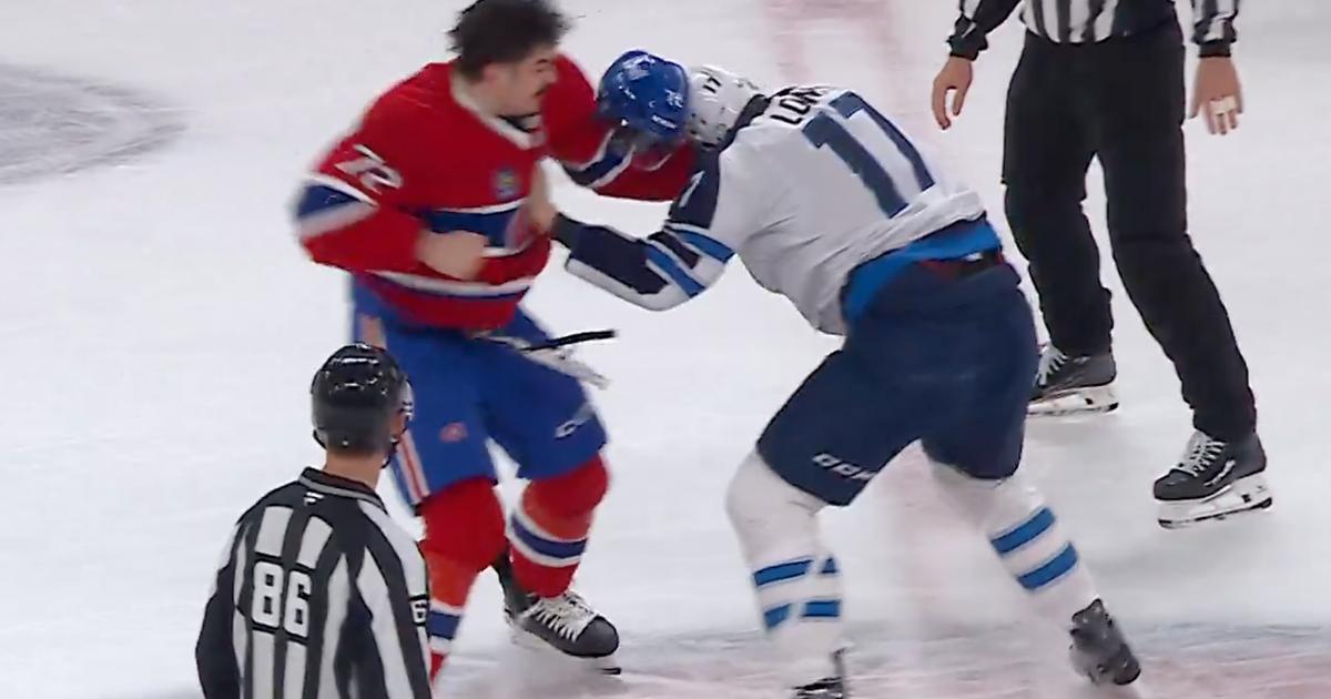Arber Xhekaj drops Adam Lowry in a heated centre-ice fight