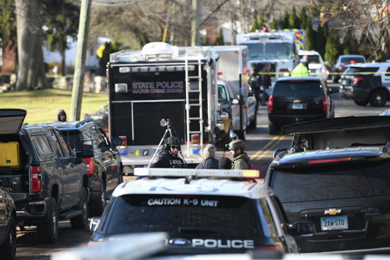 Police find decomposed body and bombs after standoff with armed man
