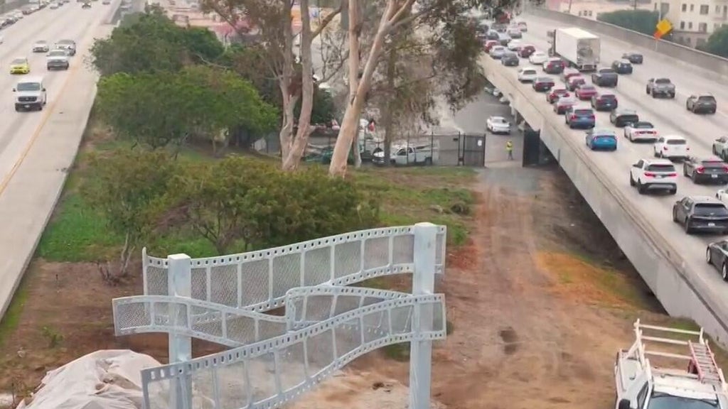 Filmstrip sculpture rises along the East Hollywood 101 Freeway