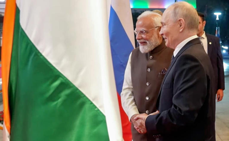 In pics: PM Modi greets Vladimir Putin at Delhi airport with hug, handshake