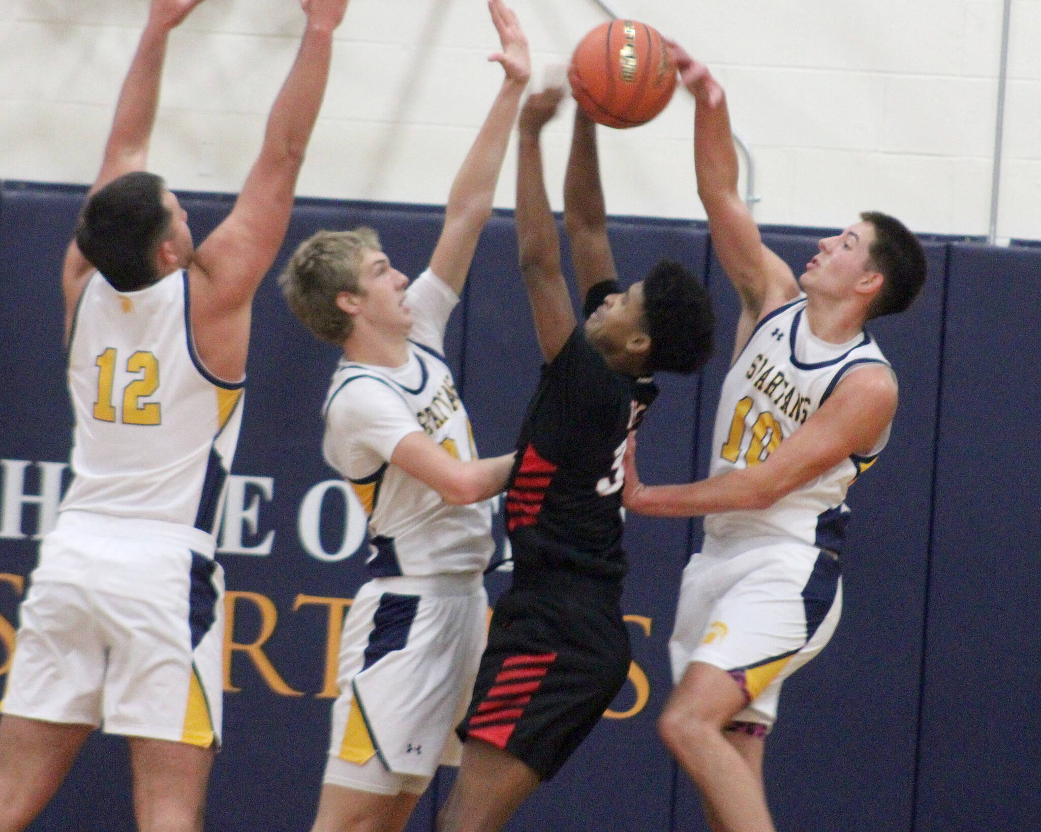 Spartans hold on for OT win in Orness’ coaching return