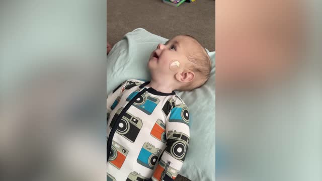 Young boy surprises medical experts by sending kisses to his family