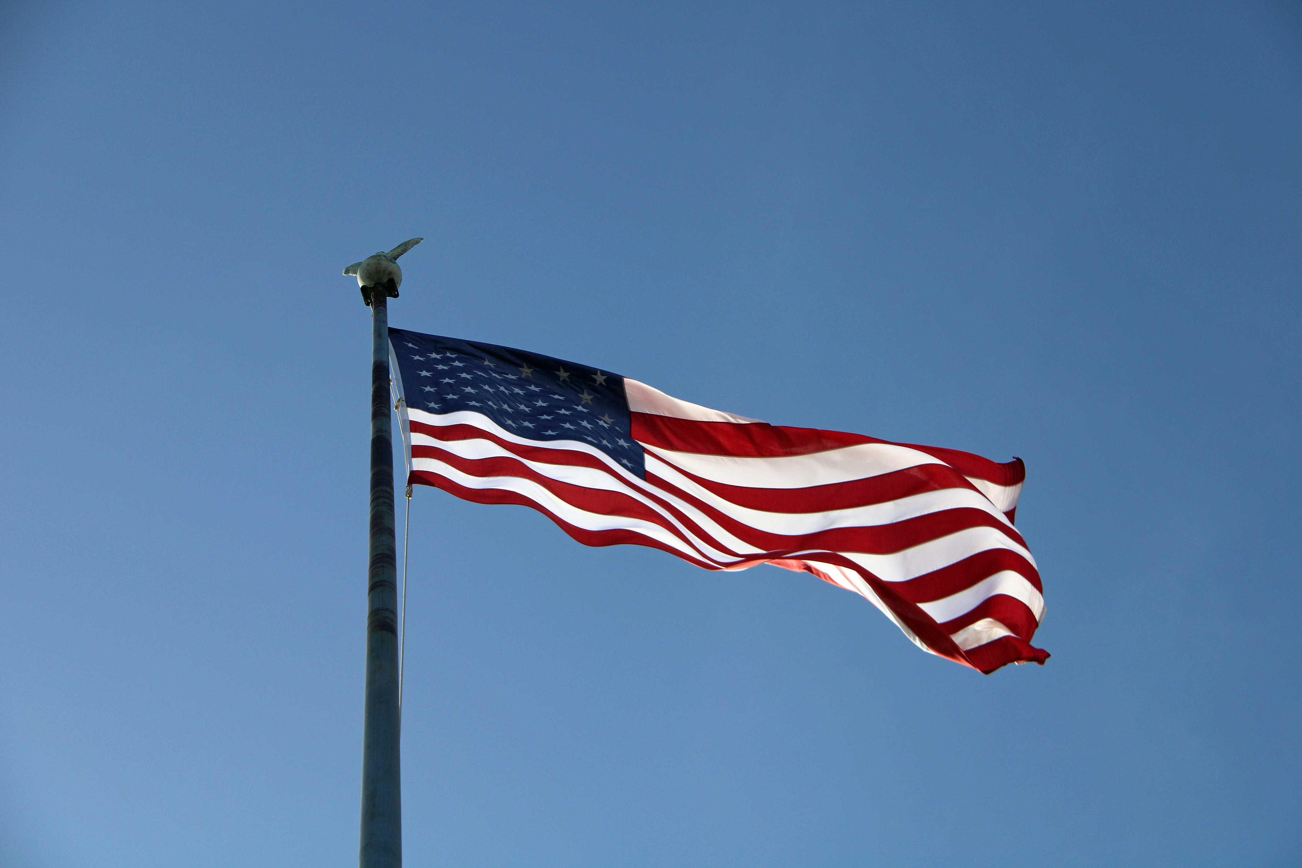 Why are Colorado flags at half-staff?