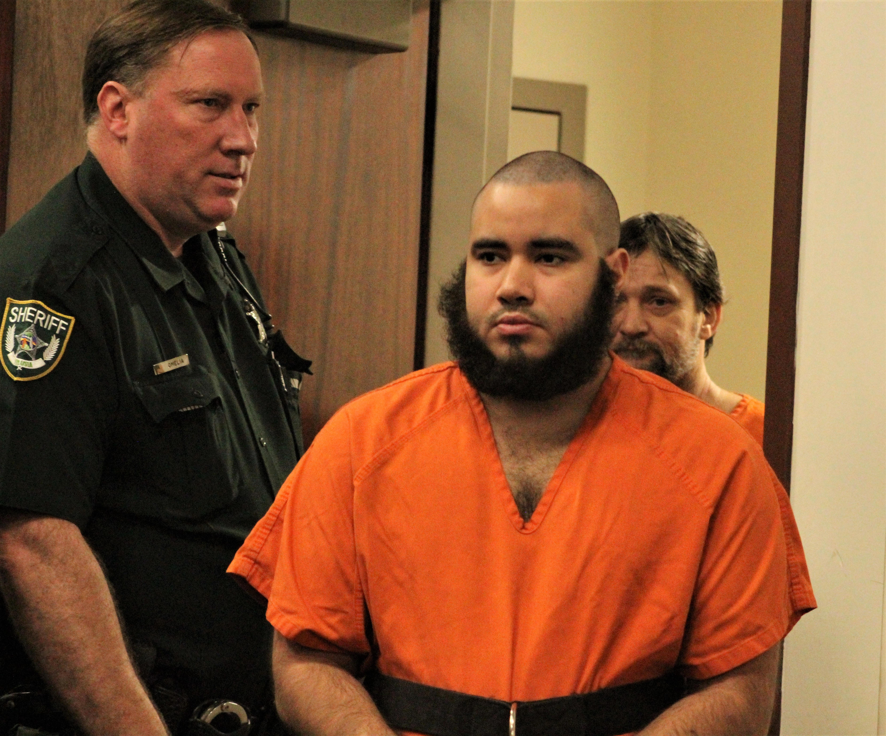 Family of Edgewater officer slain by Circle K clerk files suit