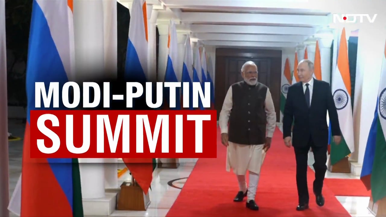 PM Modi welcomes 'friend' Putin with hug, handshake & special carpool