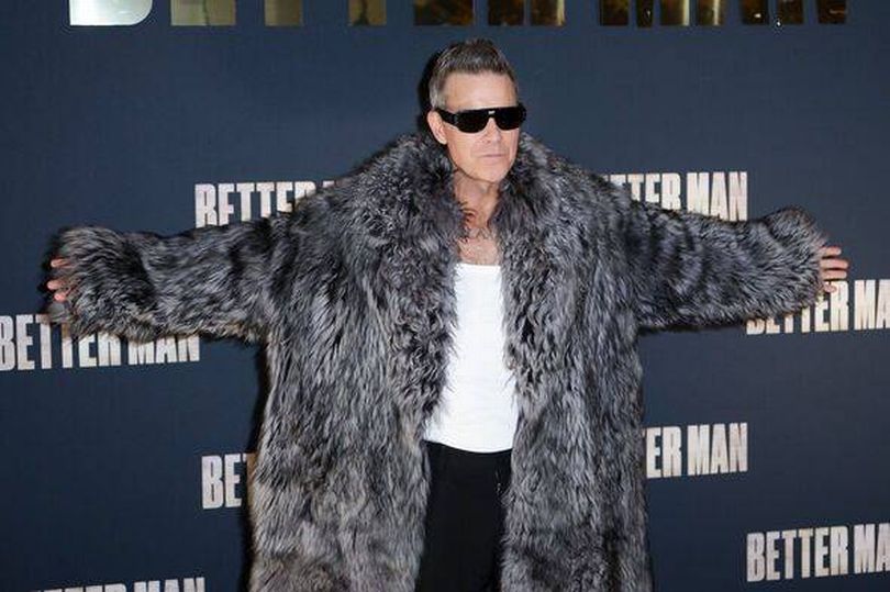 Robbie Williams' career flop in US with monkey film as he performs at ...