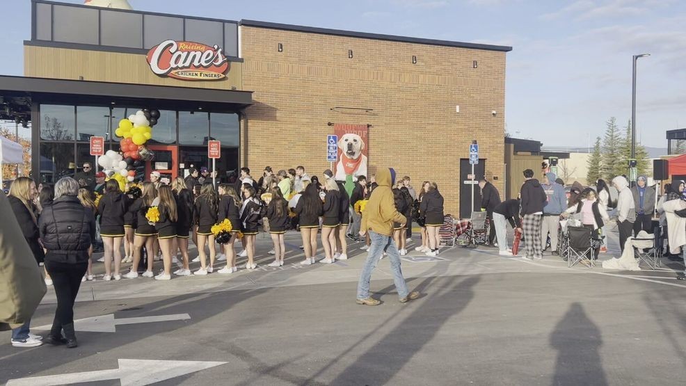 Chicken lovers camp overnight for Raising Cane's grand opening