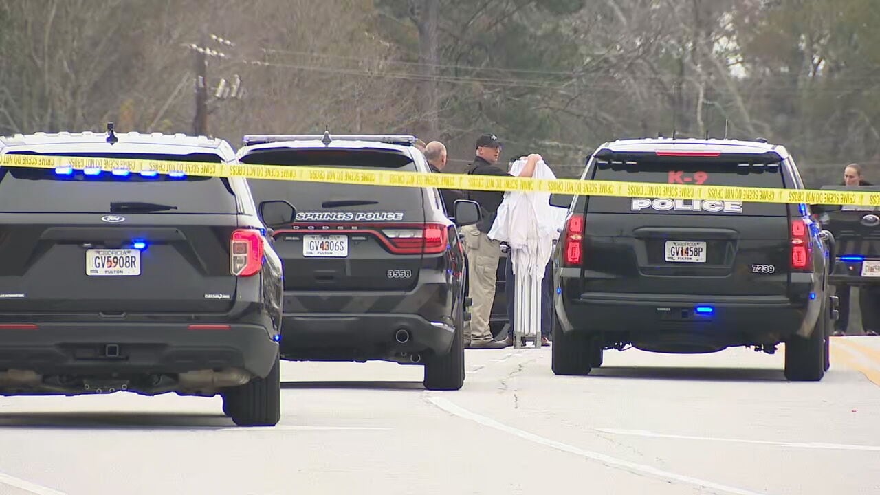 Man accused of assaulting woman shot by police after pulling gun out