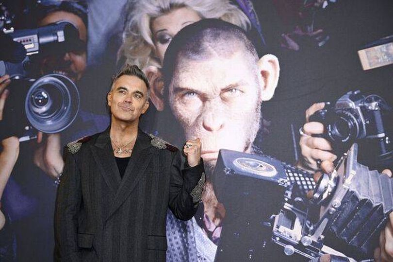 Robbie Williams' career flop in US with monkey film as he performs at ...