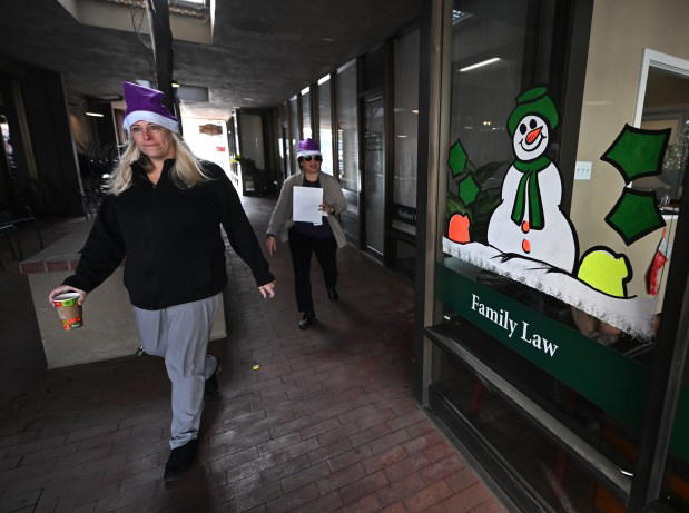 Holiday walk spotlights union, county tensions