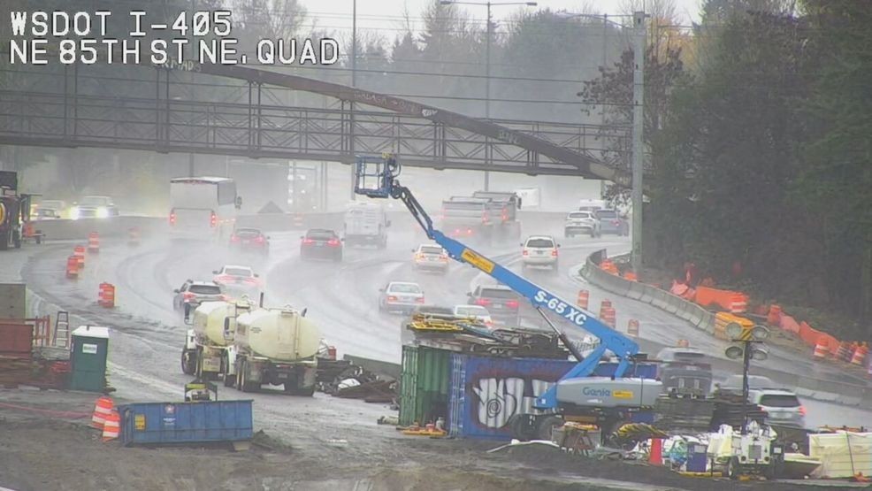 Truck carrying excavator hits Kirkland overpass, closing pedestrian ...