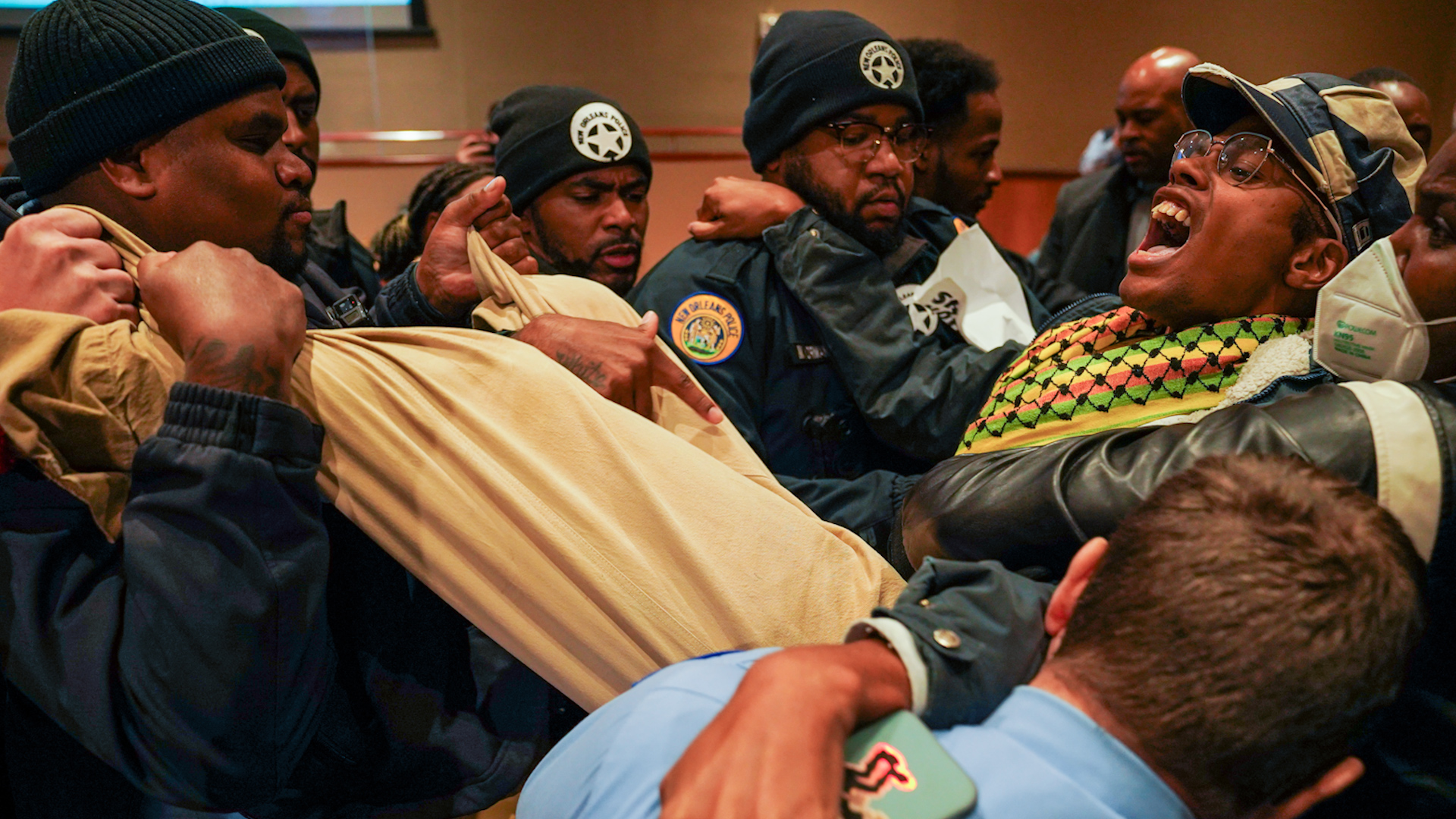 Police remove anti-ICE protesters from New Orleans City Hall
