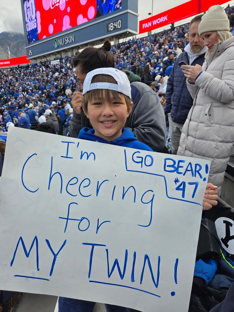 ‘I’m cheering for my twin!’ How this young BYU fan caught Bear Bachmeier’s attention
