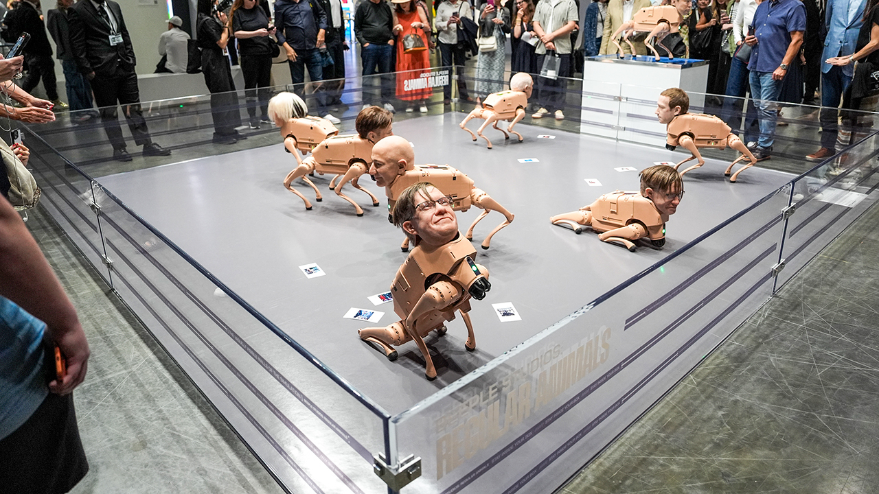Billionaire heads on robot dogs' pooping photos go viral at major Miami ...