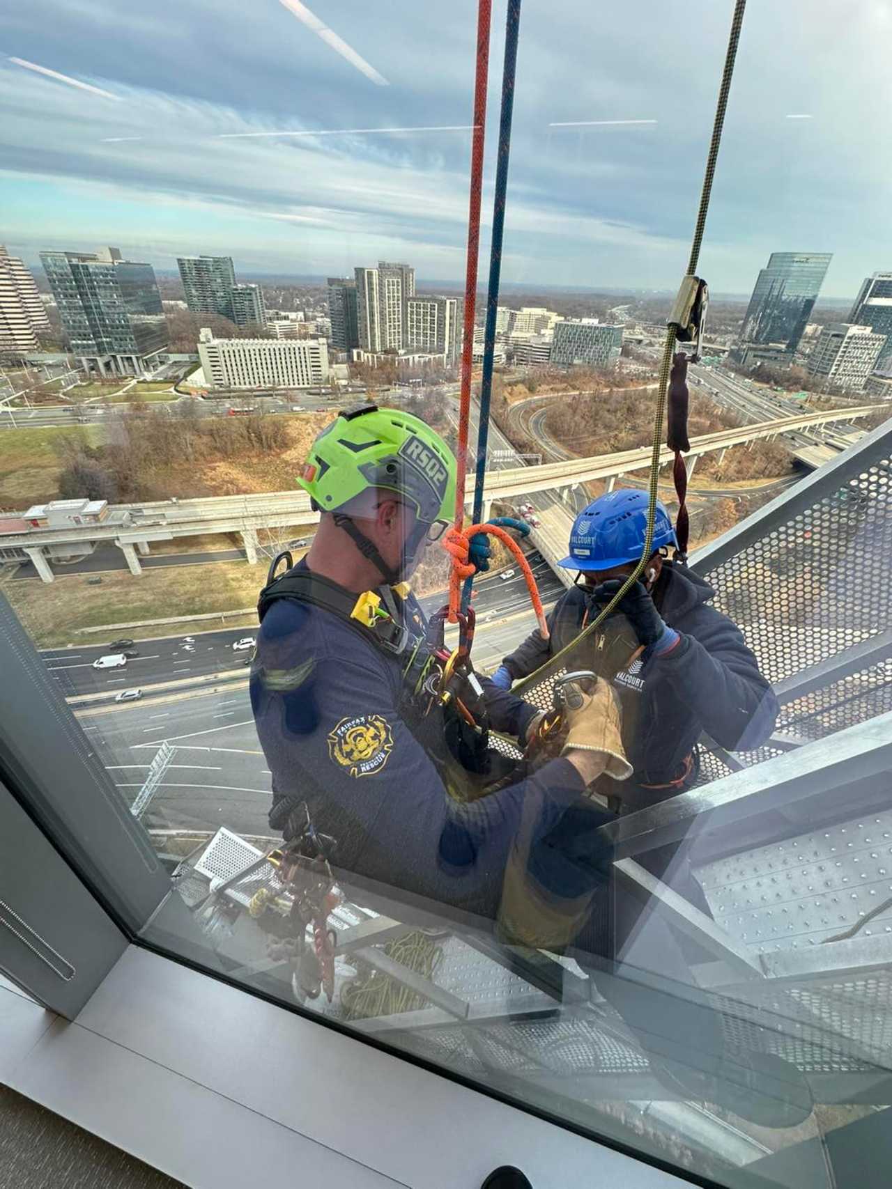 Watch: Window washers left swinging over Virginia as scaffold snaps 15 ...