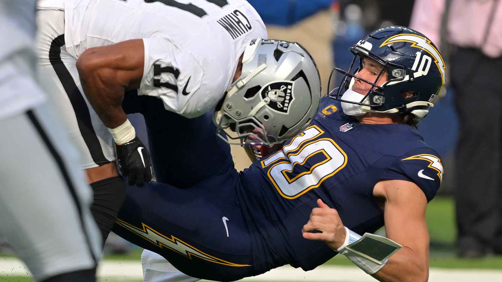 Chargers’ Justin Herbert officially limited at first practice since ...