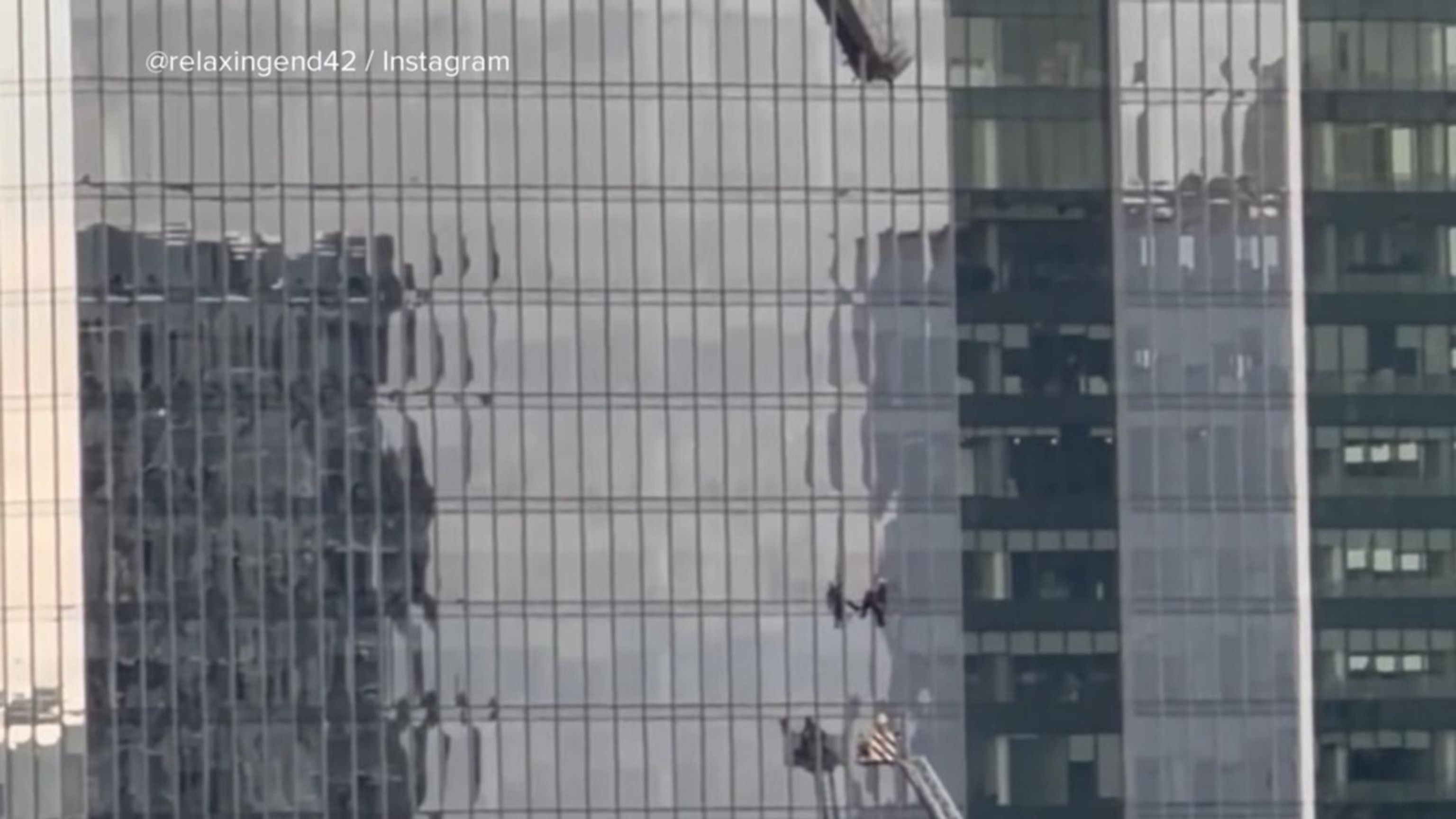 Virginia window washers dangling from high-rise building rescued