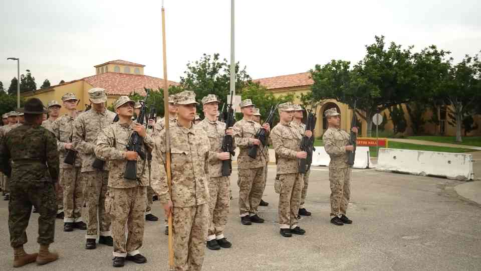 Marine recruits receive their first service rifle