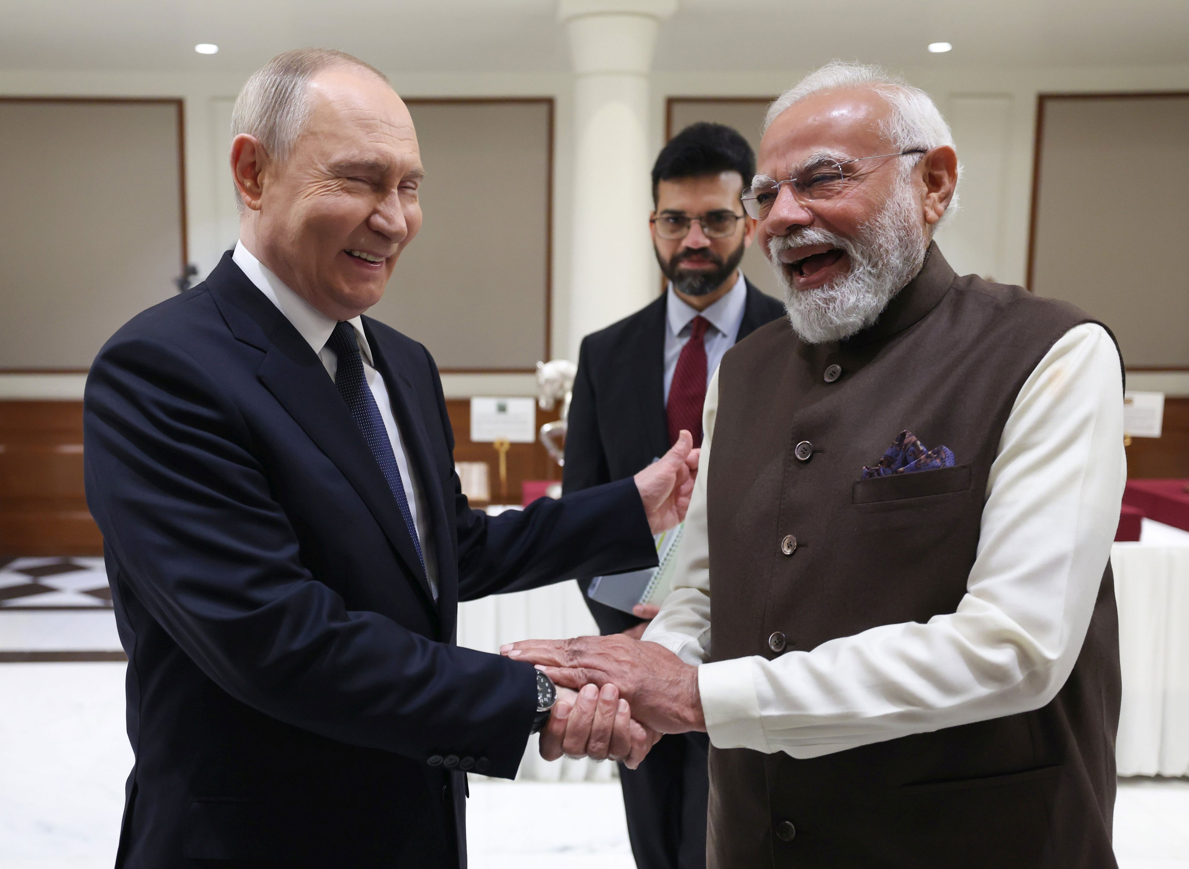 Handshake, hugs, carpool: Pictures capture PM Modi-Putin bonhomie in India