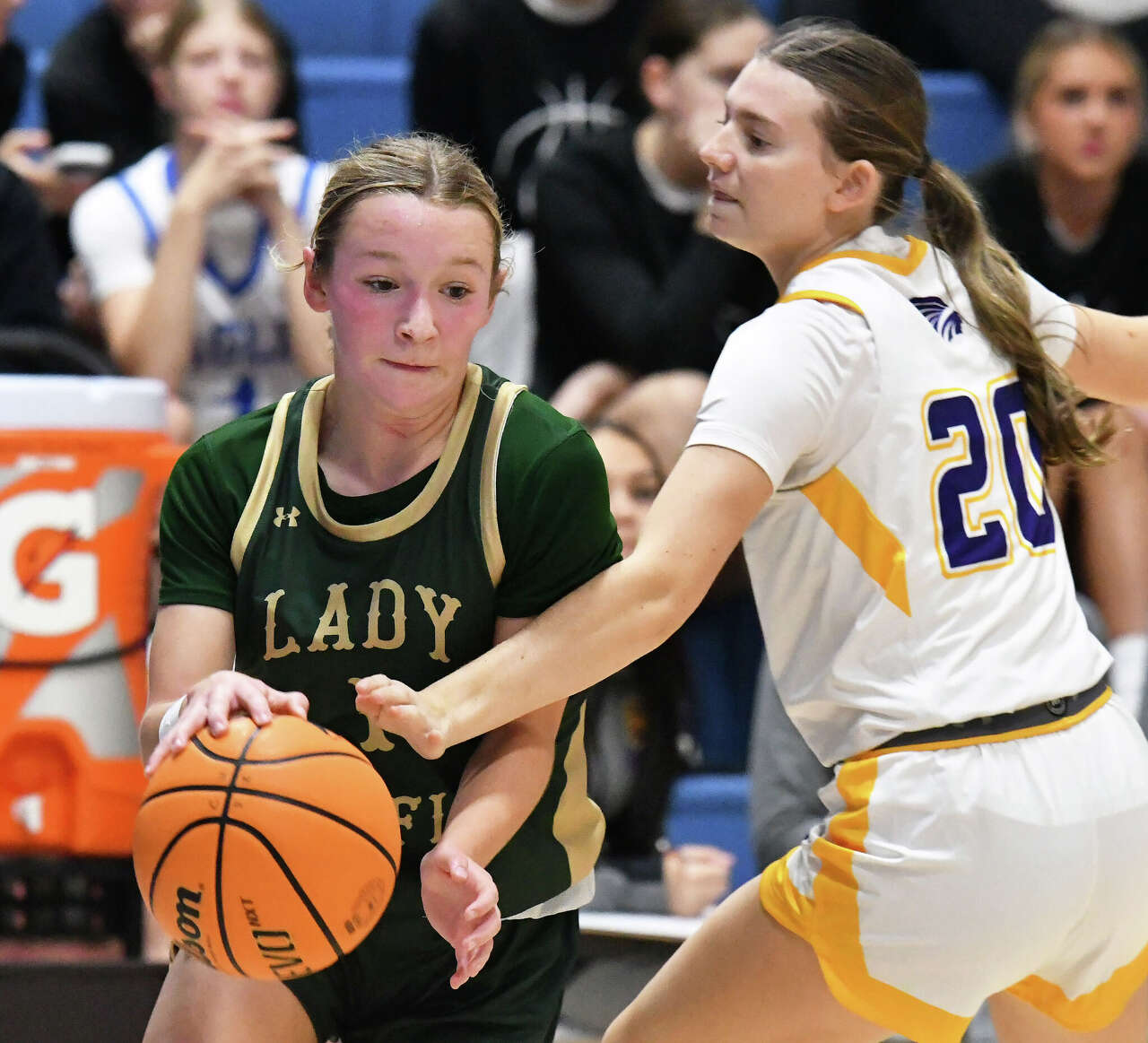 Father McGivney girls top defending league champs