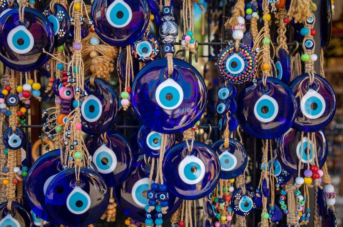 The history behind good luck charms around the world, like kissing the ...