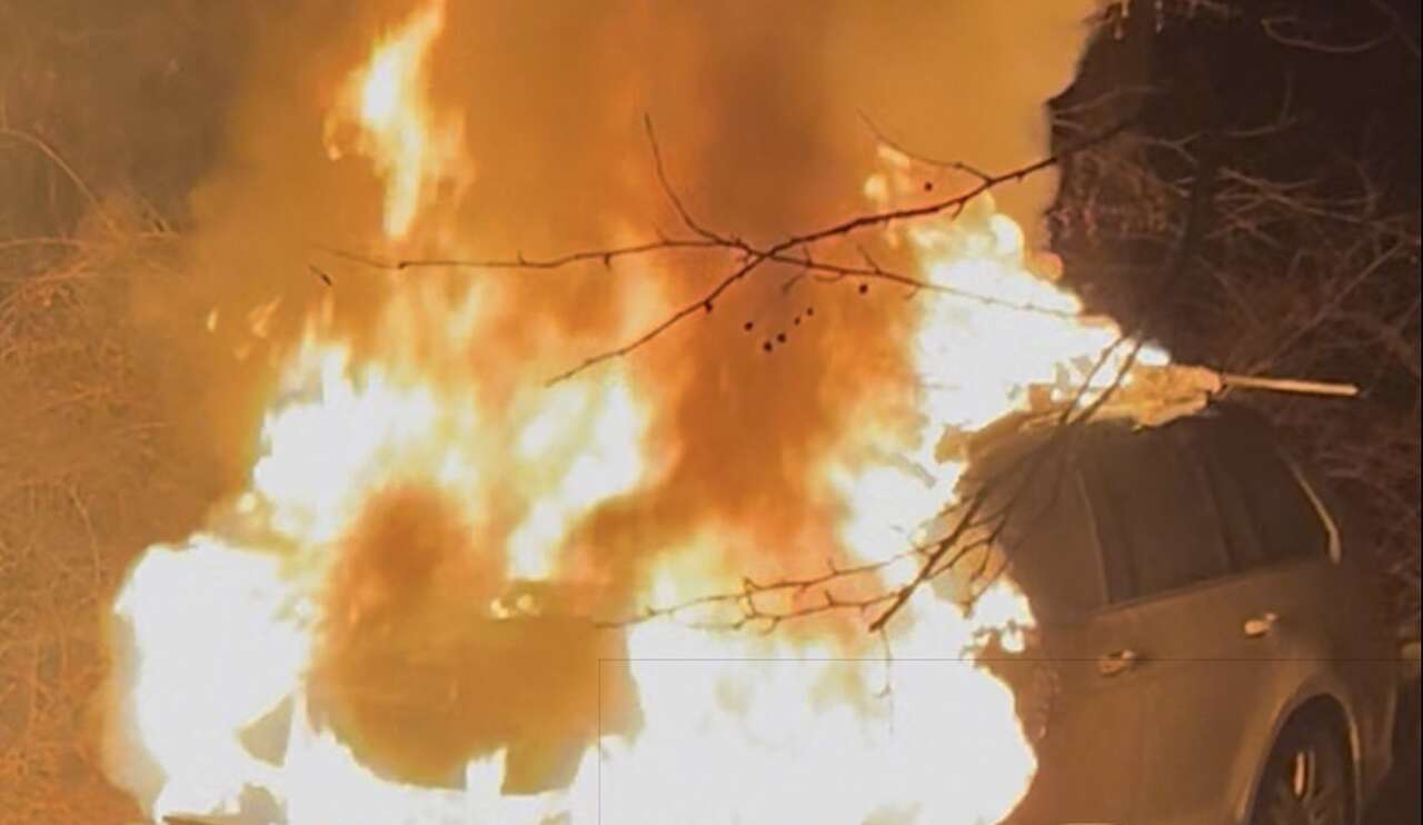 Car found burning in Weston driveway on Georgetown Road, fire officials say