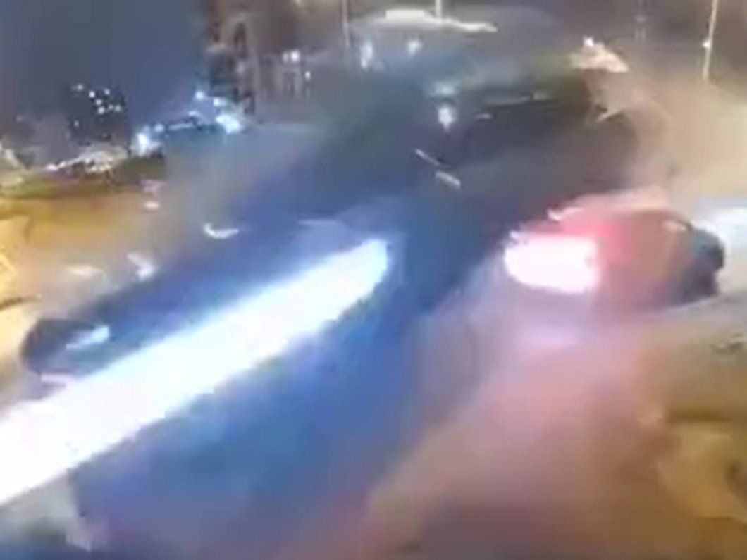 Spectacular: Car flies over roundabout and two other vehicles