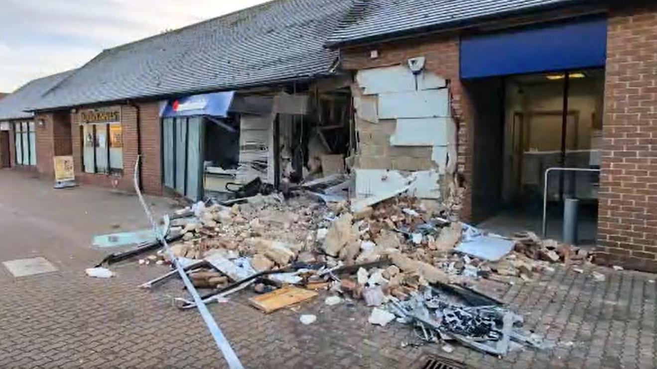 Building society wrecked in cash machine ram-raid