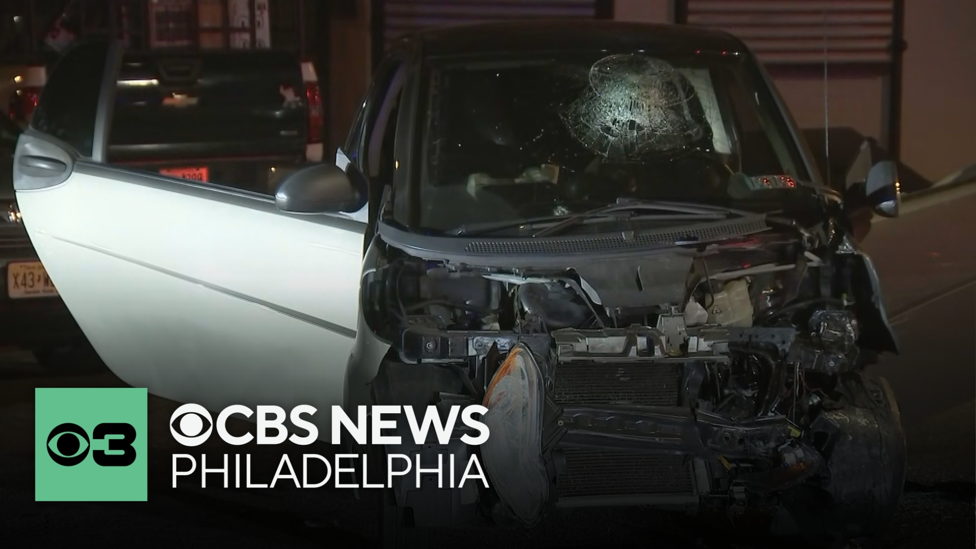 2 people in Smart car, 2 police officers taken to hospitals after crash