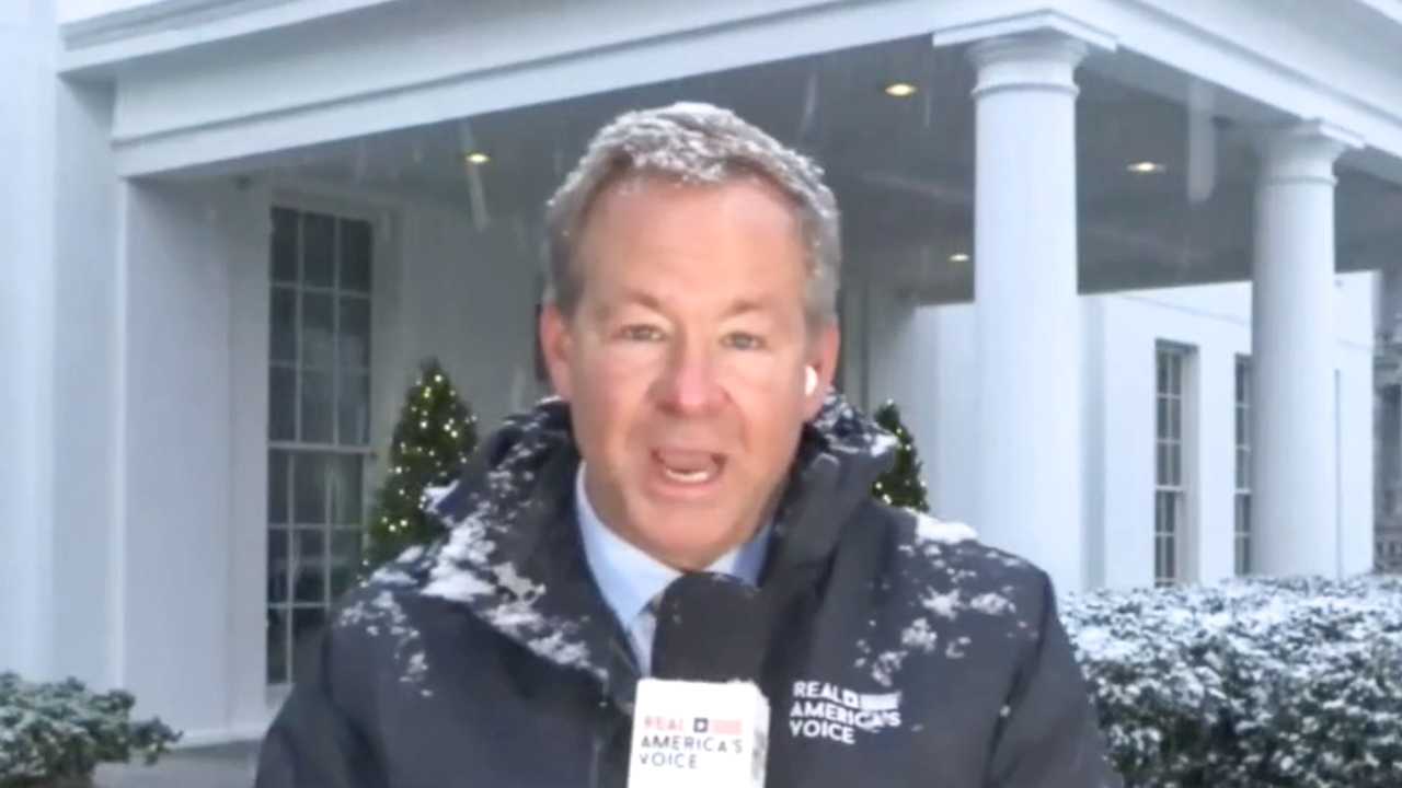 MAGA reporter loses it making snow angels on White House lawn