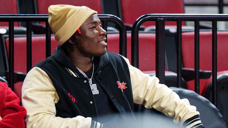 Emmett Johnson's official exit to the NFL raises uncomfortable ...