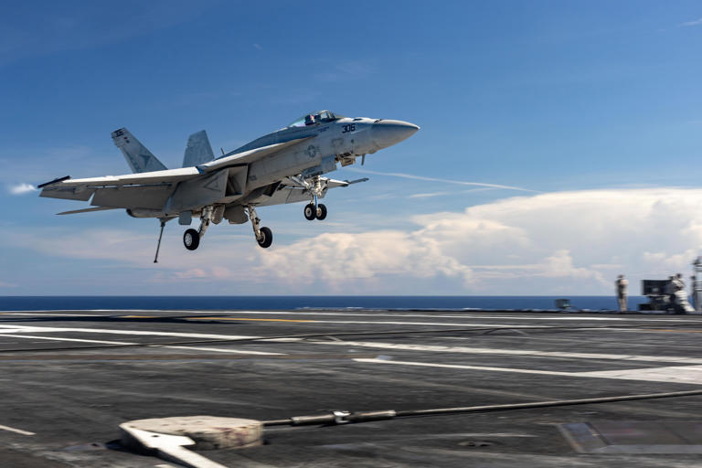 With a boom and sparks, this $60 million Navy jet's aircraft carrier ...