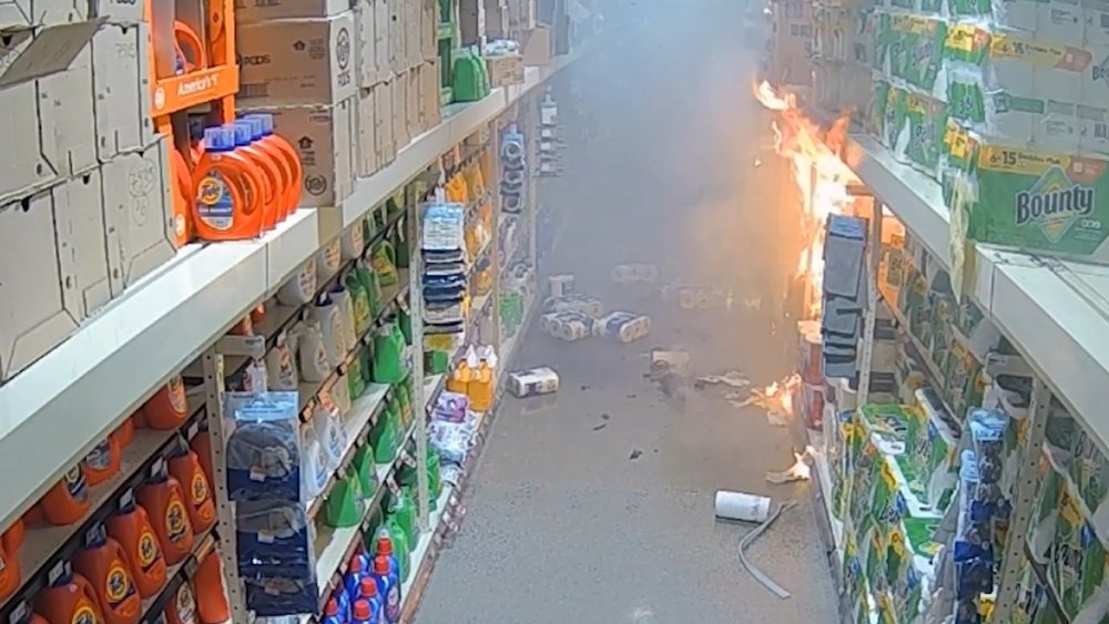 Employee sets fire to shelf with paper products in supermarket