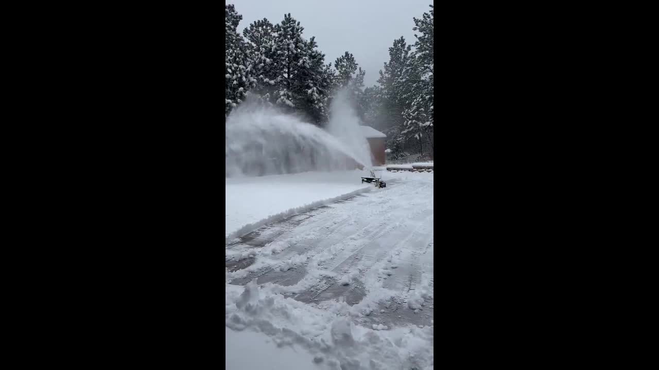 Yarbo snowblower clears deep snow after winter storm in Monument