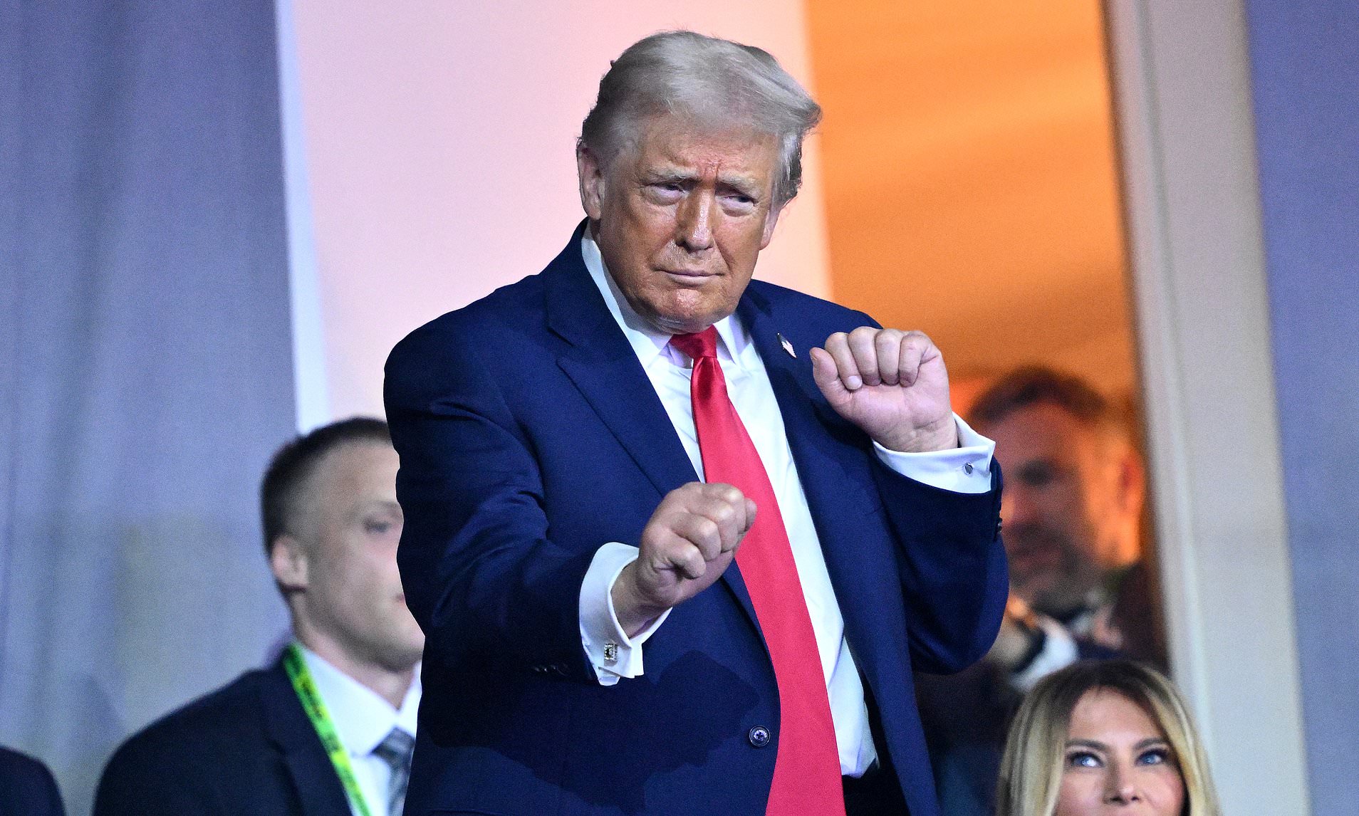Trump gets surprise approval boost as a roaring economic signal lifts ...
