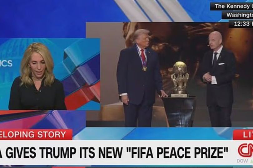 CNN hot mic catches reporter laughing as Donald Trump receives award