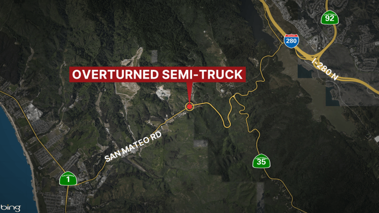 Overturned semi-truck closed down Highway 92 near Half Moon Bay