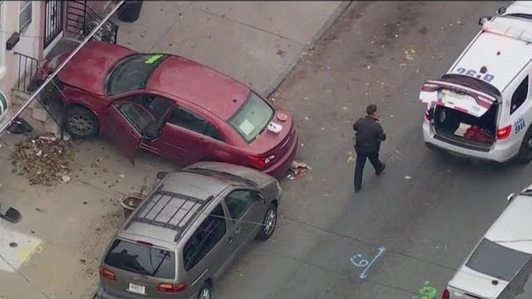 Philly officer hit during traffic stop before car crashes into home ...