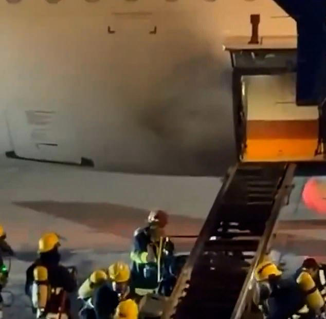 Panicked passengers told to 'leave everything' and flee plane as it is ...
