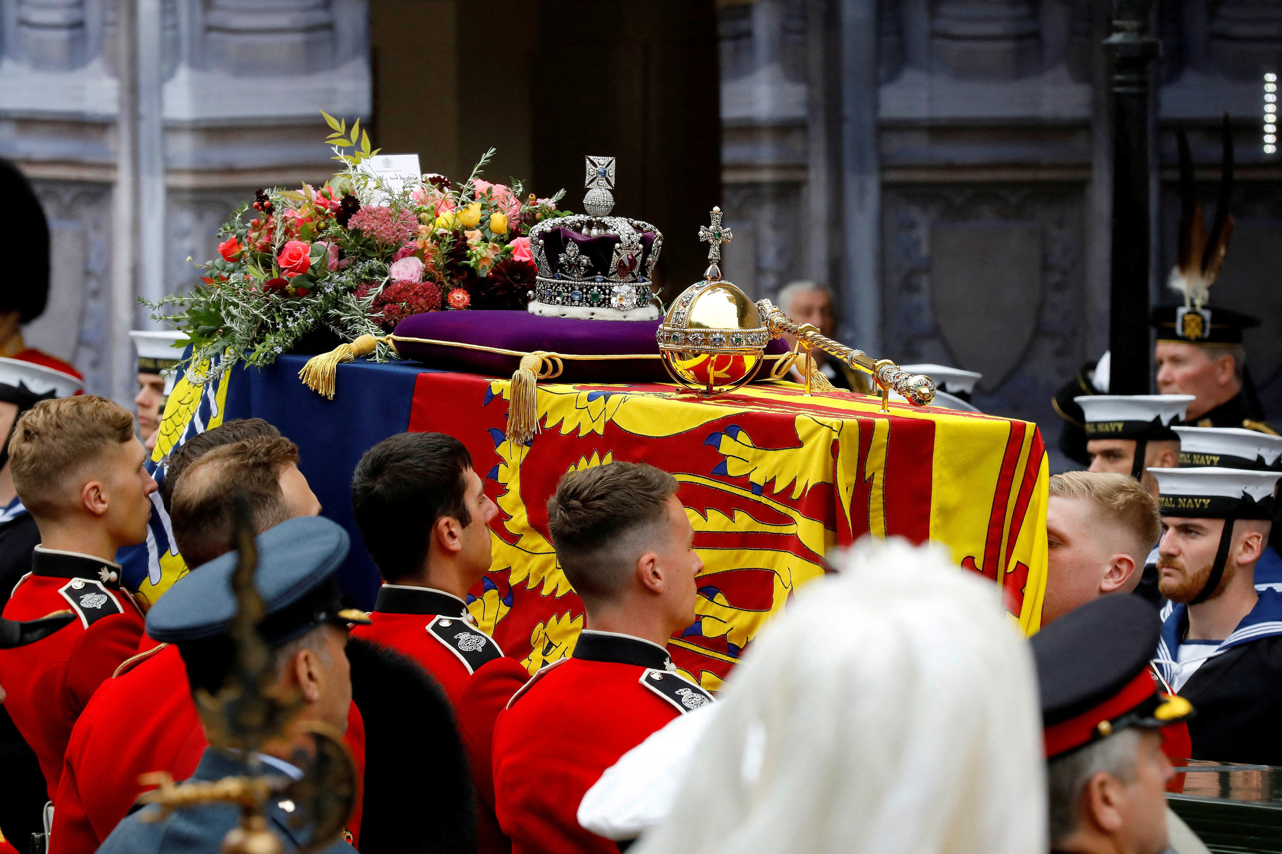 Tax-the-rich protesters target Imperial State Crown with food