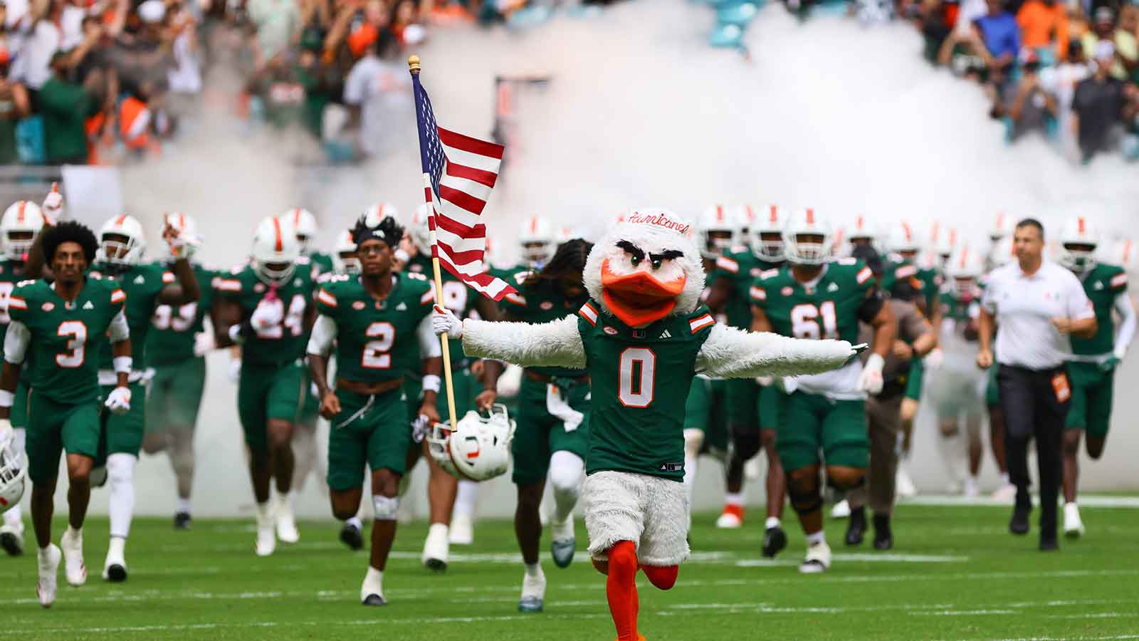 Miami football fans fly 'H2H matters, Miami in' banner near CFP hotel