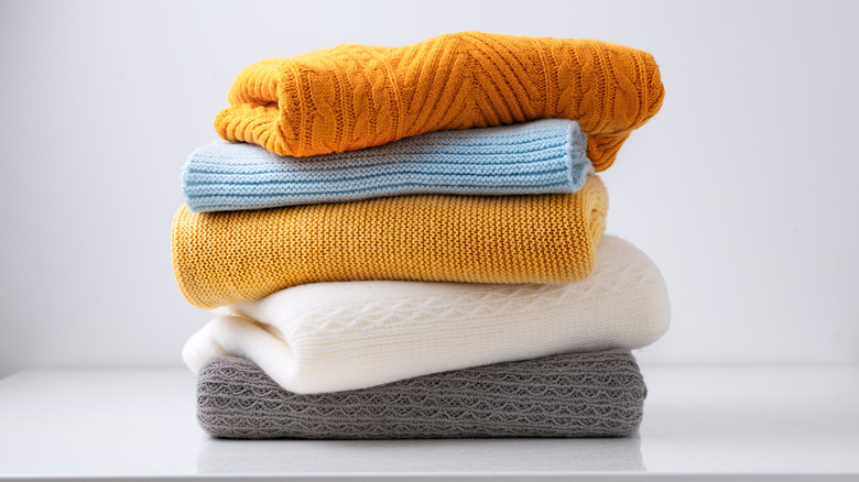 How to correctly fold sweaters for better storage and organization