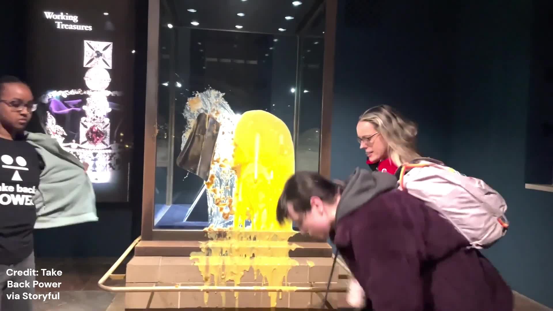 Video: 4 arrested after throwing food on England's Crown Jewels case