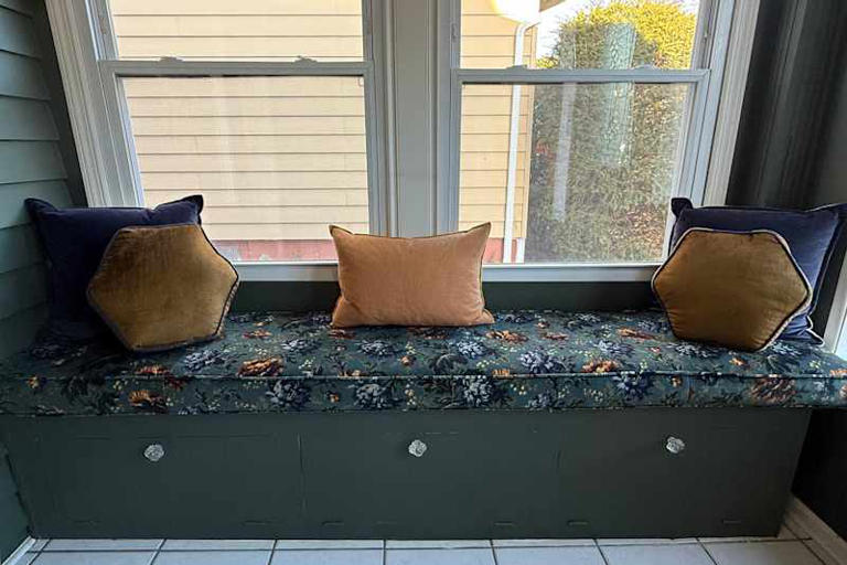 I painted my boring entryway moody green, and it's now cute as can be
